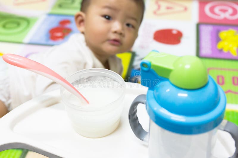 Food and water for baby. stock photo. Image of little - 93006570