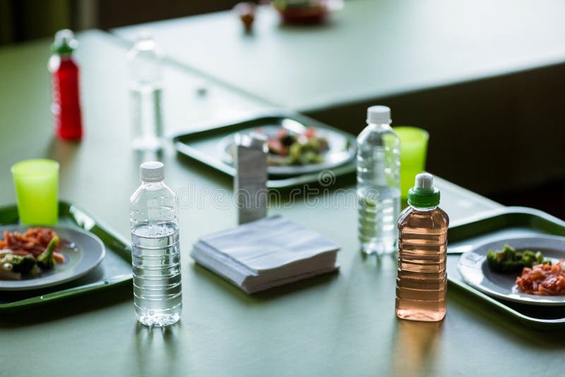 Food with Water Bottles on Table Stock Photo - Image of focus, tray ...