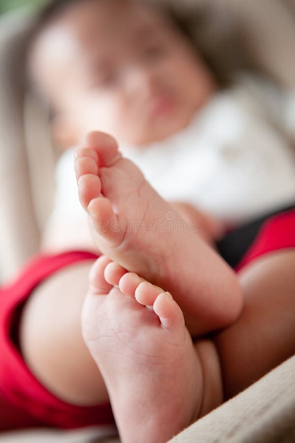 Foot of the Baby on Car Seat Stock Photo - Image of chubby, journey ...