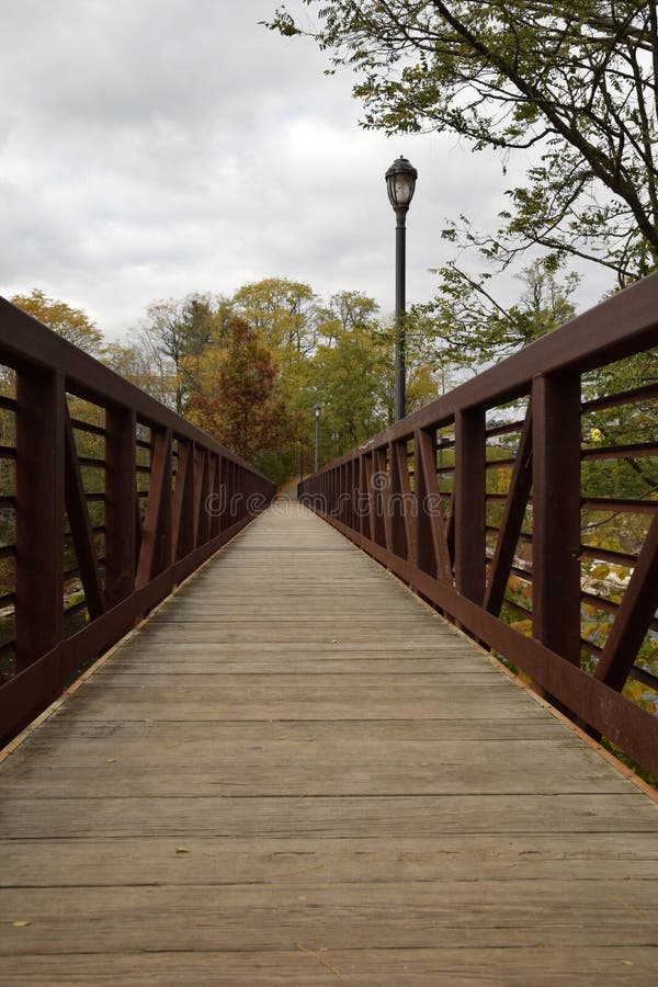 Foot Bridge stock photo. Image of perspective, lamp, walk - 83680114