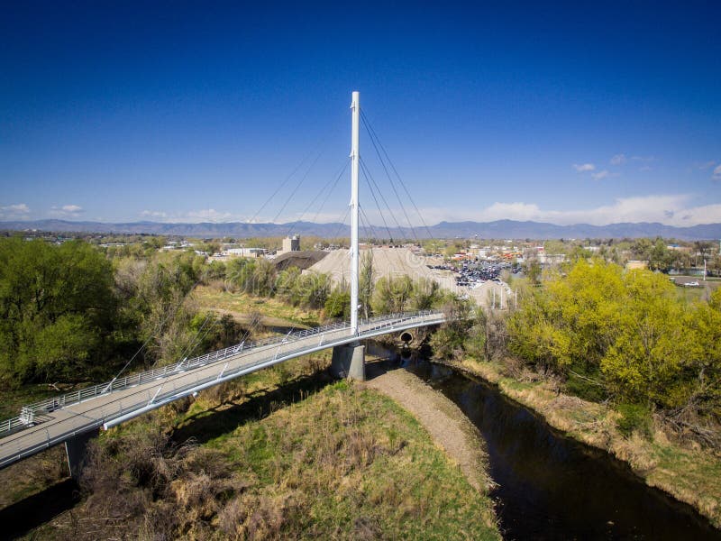 Foot Bridge Over a River in Arvada Colorado Stock Image - Image of ...