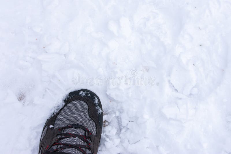 Foot with Hiking Boot on Snow Stock Image - Image of outdoor, nature ...