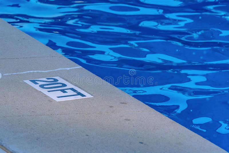 20 Foot Label by Edge of Pool Stock Image - Image of luxury, copy ...