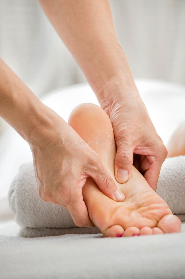 Foot Massage in the Spa Salon Stock Photo - Image of relaxation ...
