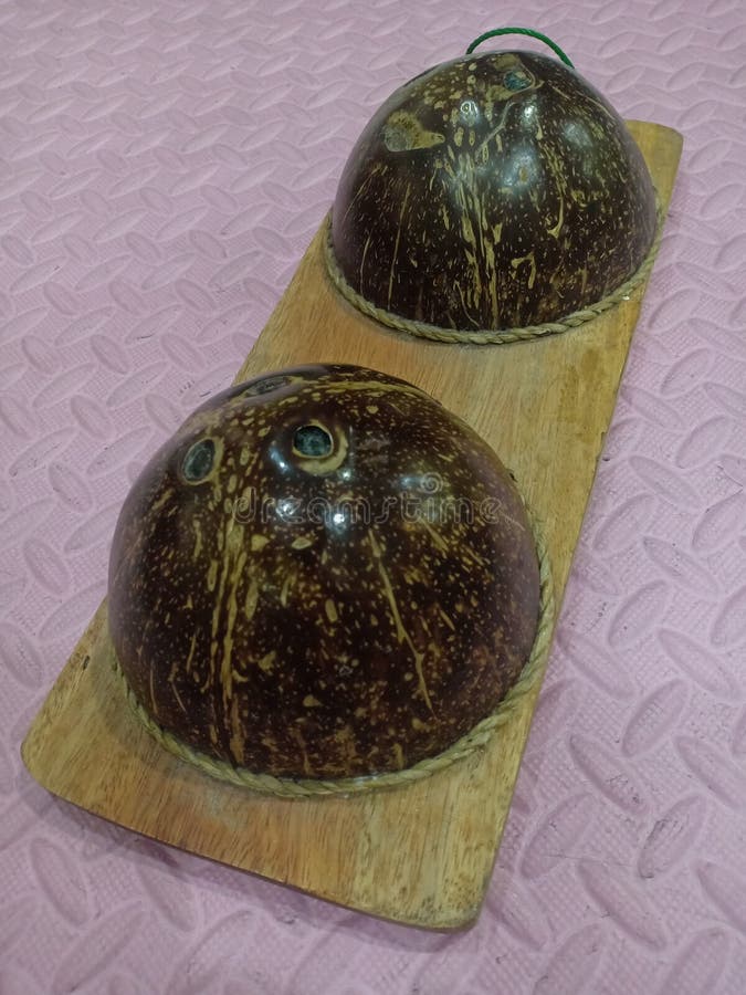 The Device Made for Sharing. Young Sisters Using a Smartphone Together ...