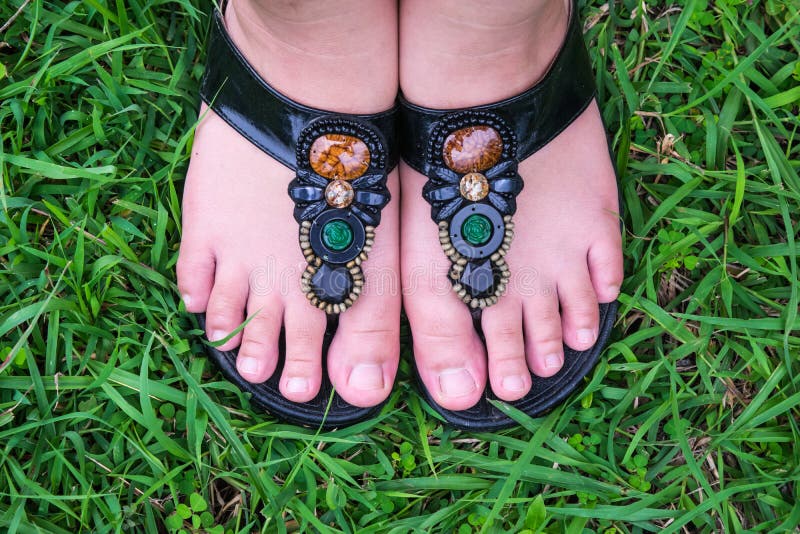 Foot over green grass stock image. Image of bare, grass - 42176997