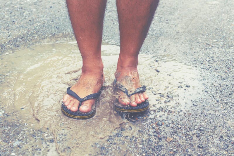 Foot in puddle. stock image. Image of foot, background - 96371695