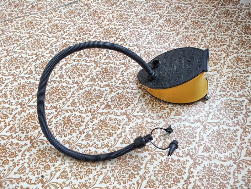 Foot Pump for Inflatable Items Stock Photo - Image of male, mechanic ...