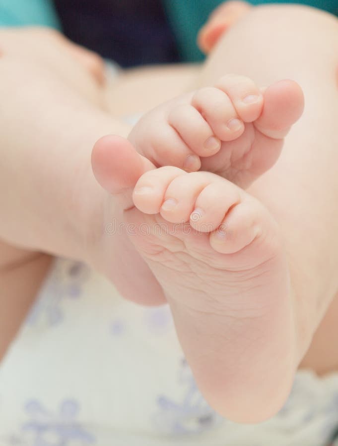 The foot of a small child. stock photo. Image of child - 49067558