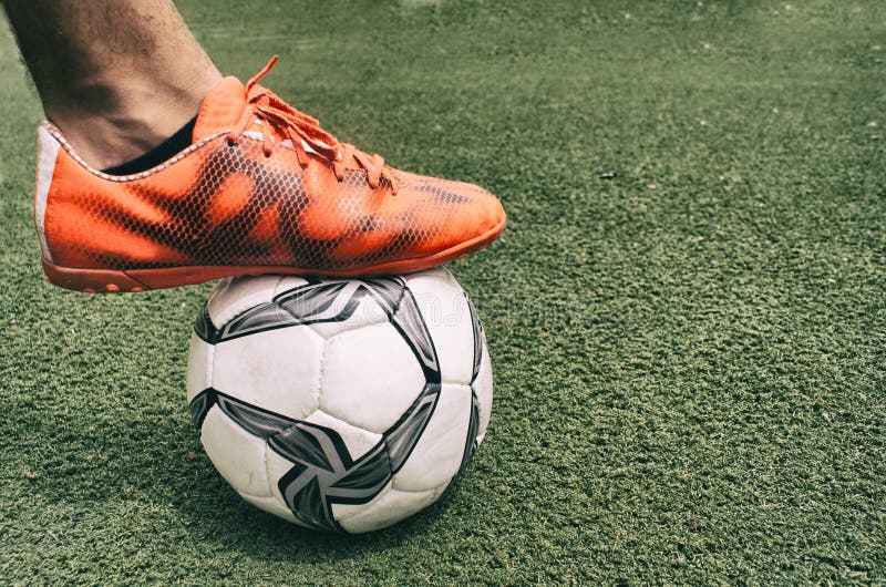 Foot and soccer ball stock image. Image of grass, ball - 56184083