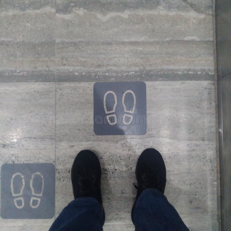 Foot steps on the tile stock photo. Image of tile, grey - 271216036