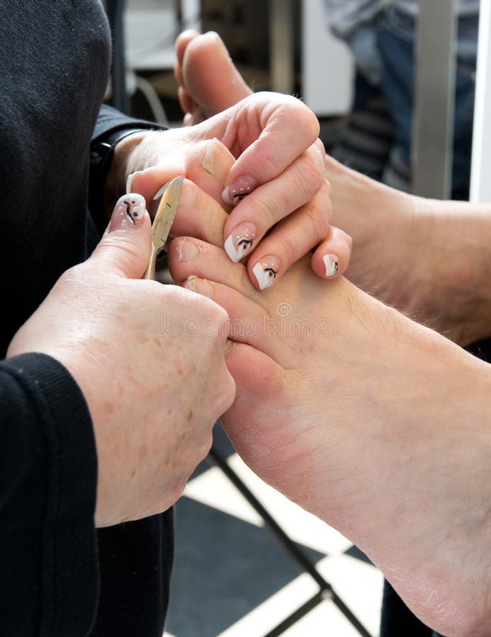 Foot Therapist Working On A Mans Feet Stock Photo - Image of female ...