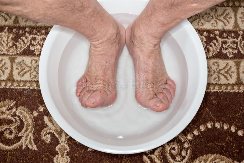 Foot washing in washbasin stock photo. Image of hammer - 177558030