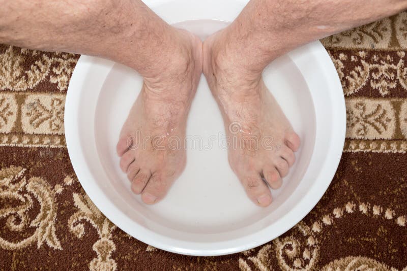 Foot washing in washbasin stock image. Image of lavatories - 177561901