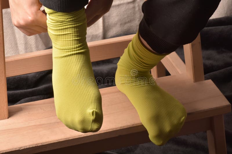 Foot wearing socks stock image. Image of legs, wearing - 310518609