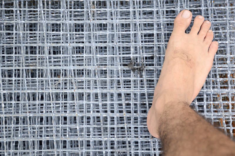 Foot on wire net stock image. Image of tread, wire, detail - 78898745