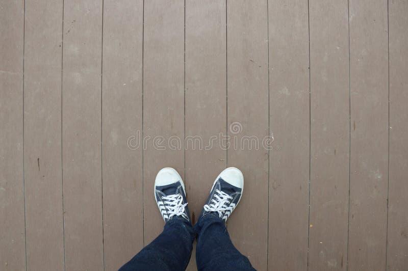 Foot on wood floor stock photo. Image of shoes, floor - 97068682