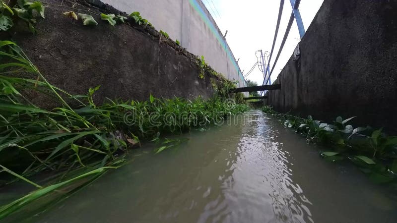 Heavy Flow of Water Along the City Drainage System. Stock Video - Video ...