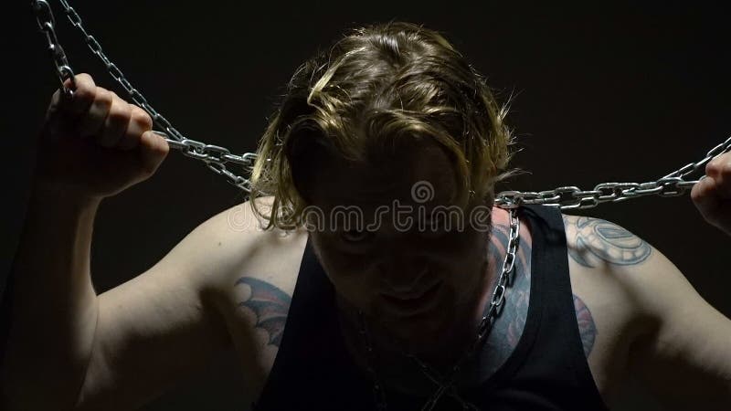 Frightened Blond Captive Bound in Chains Stock Footage - Video of ...