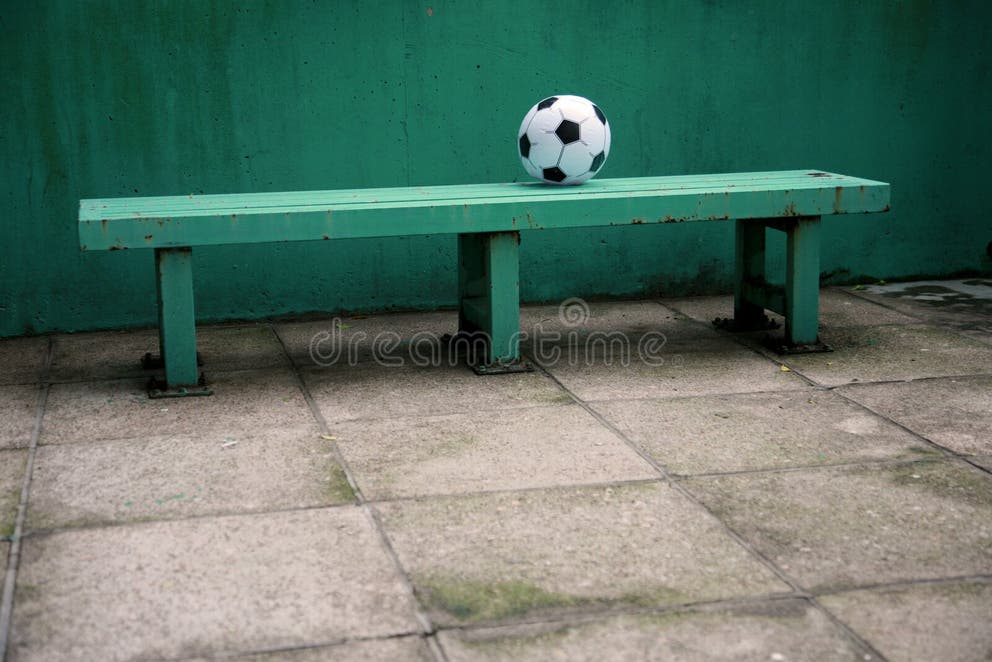 Football on bench stock image. Image of football, single - 1591907