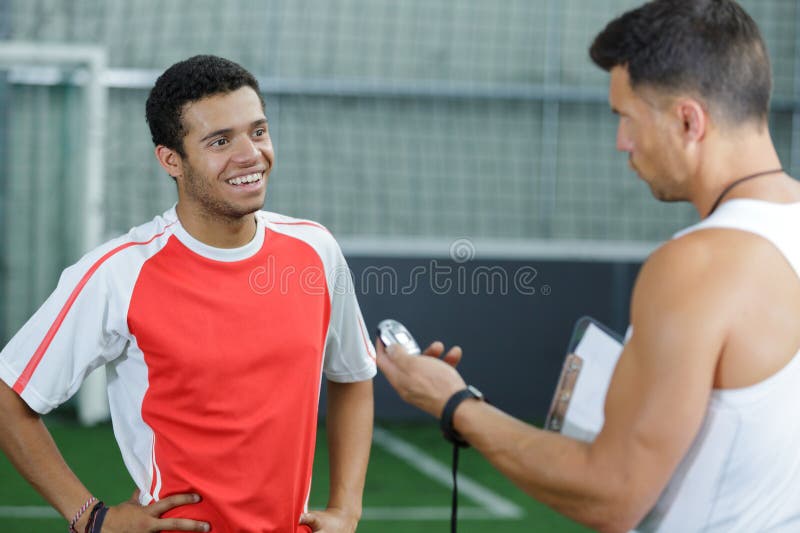 Football Coach Holding Stop Watch Stock Image - Image of seconds ...