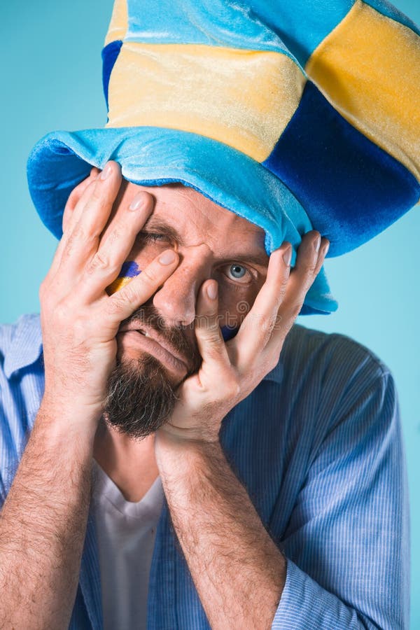 The football fan over blue stock image. Image of home - 98677405