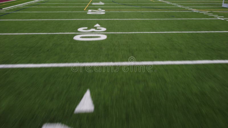Football Field that is Lit Up in the Night. Flying Over Illuminated ...
