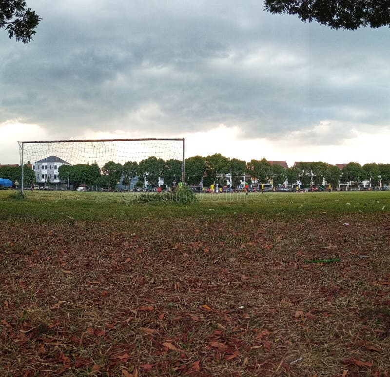 Football Field in the Afternoon People Playing Stock Image - Image of ...