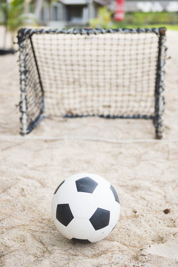 Football in Front of the Mini Goal on the Sand Stock Photo - Image of ...