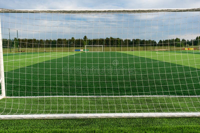Football Goal on the Field, View of the Goal from Behind Stock Photo ...