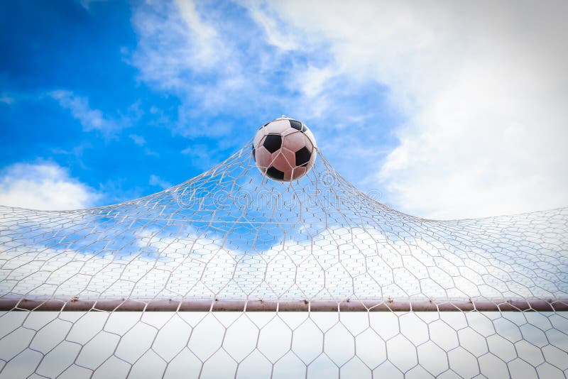Football in goal net stock image. Image of leather, green - 31964913