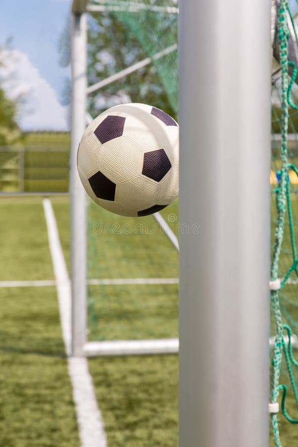 Football between Goal Posts Stock Image - Image of move, action: 44231551