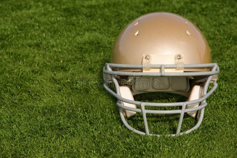 Football Helmet on Artificial Turf Facing Forward Stock Image - Image ...
