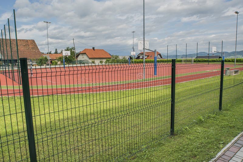 Football Pitch with Mesh Fences Stock Photo - Image of active, outdoor ...