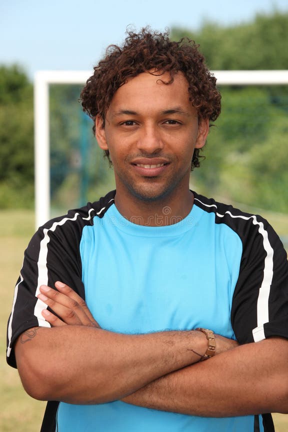 Football player stock photo. Image of folded, frontview - 28297590