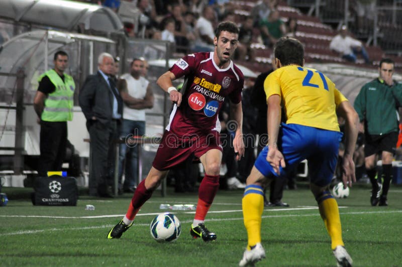 Football player in action editorial image. Image of grass - 26428570