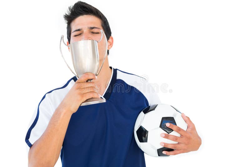 Football Player Blue Holding Winners Cup Ball Stock Photos - Free ...