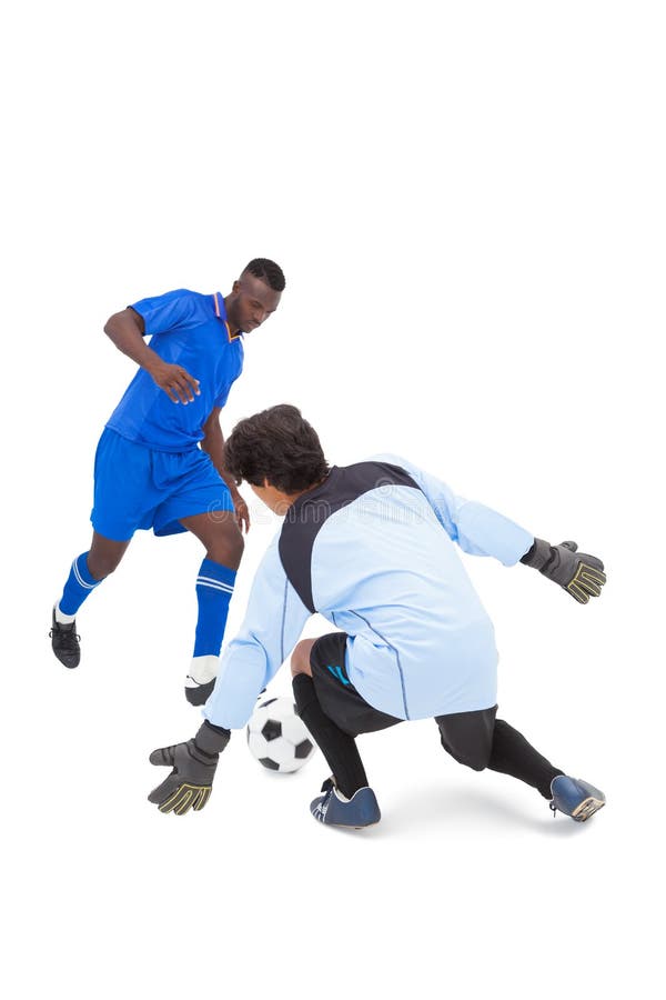 Football Player in Blue Striking at Keeper Stock Photo - Image of ...