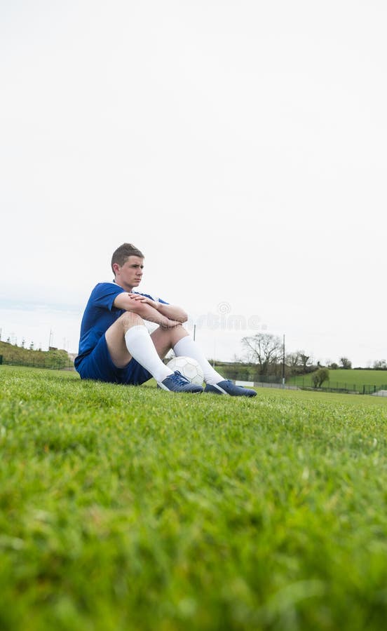 Football Player in Blue Taking a Break on the Pitch Stock Photo - Image ...