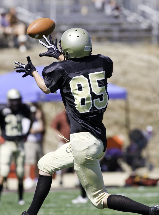 Football Players Running Down the Field Stock Image - Image of stadium ...