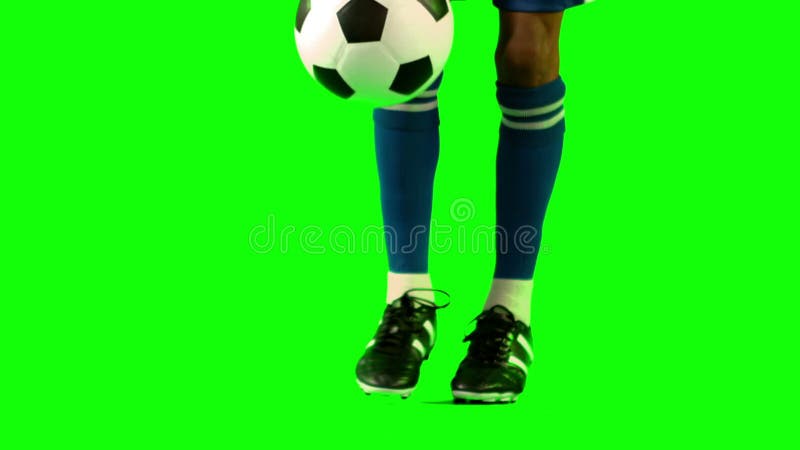Man Controlling a Football with His Chest on Green Screen Stock Footage ...