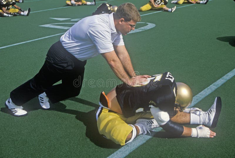 Football Player Doing Pre-game Stretch Editorial Image - Image of ...