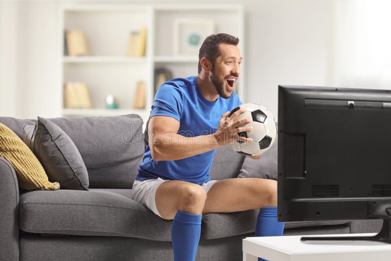 Football Player Watching a Game on Tv Stock Image - Image of happy ...