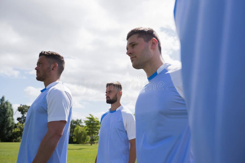 Football Players Standing in Ready Position Stock Image - Image of ...