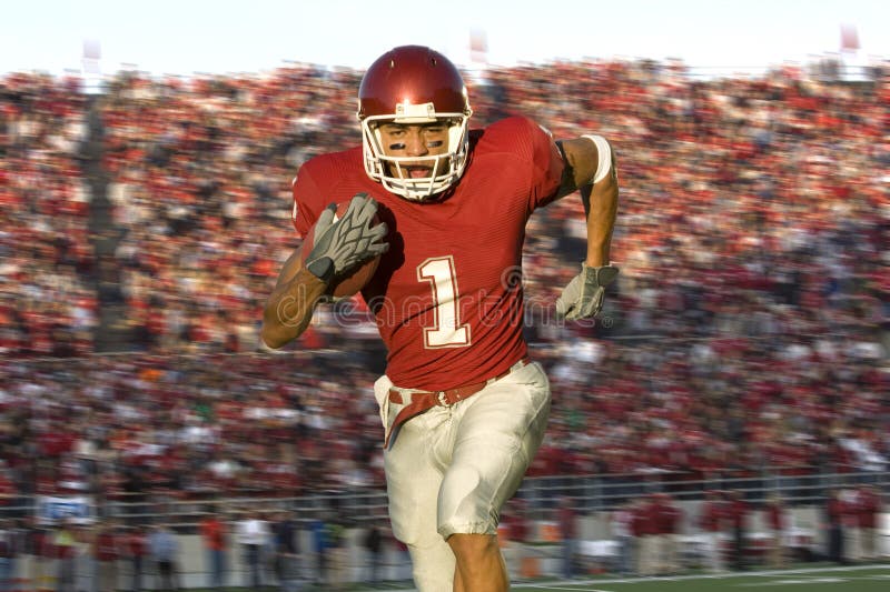 Football Running Back Running Down the Field Stock Photo - Image of ...