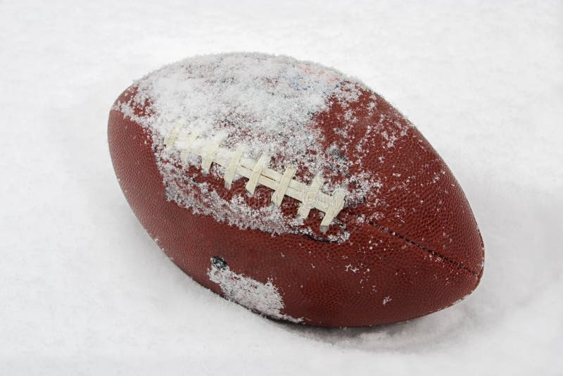 Football in the Snow stock image. Image of weather, american - 4364443