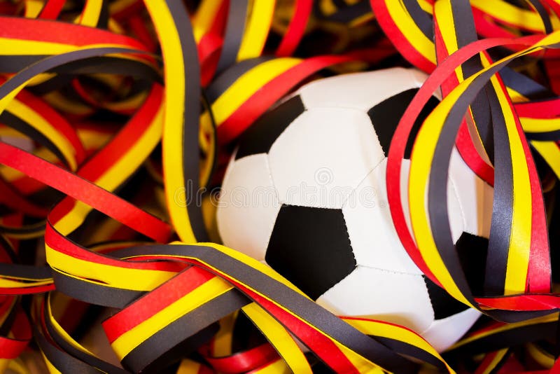 Football and streamers stock image. Image of paper, yellow - 40554669