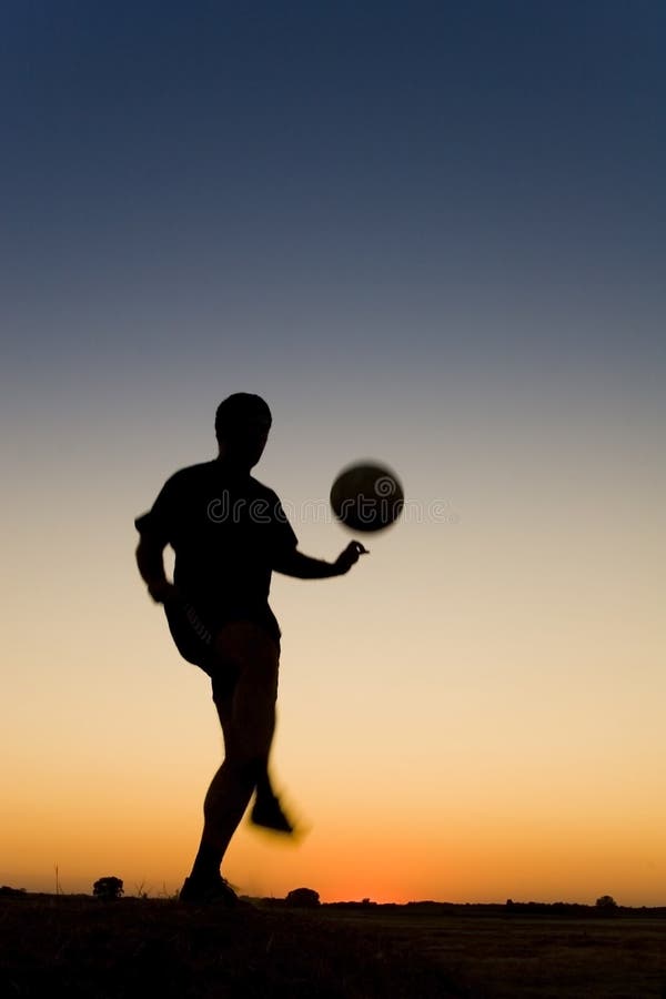 Football at sunset stock photo. Image of sunrise, lifestyle - 2791062