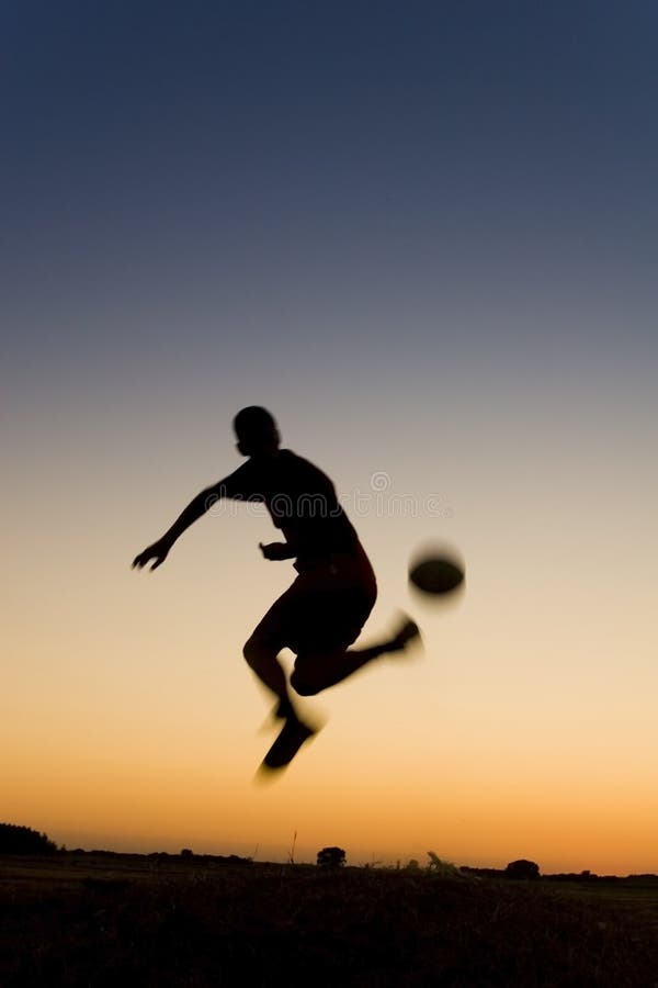 Football at sunset stock photo. Image of sunrise, lifestyle - 2791062