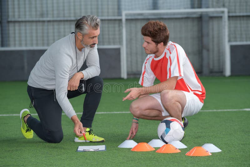 Football Trainer and Player during Practice Stock Image - Image of ...